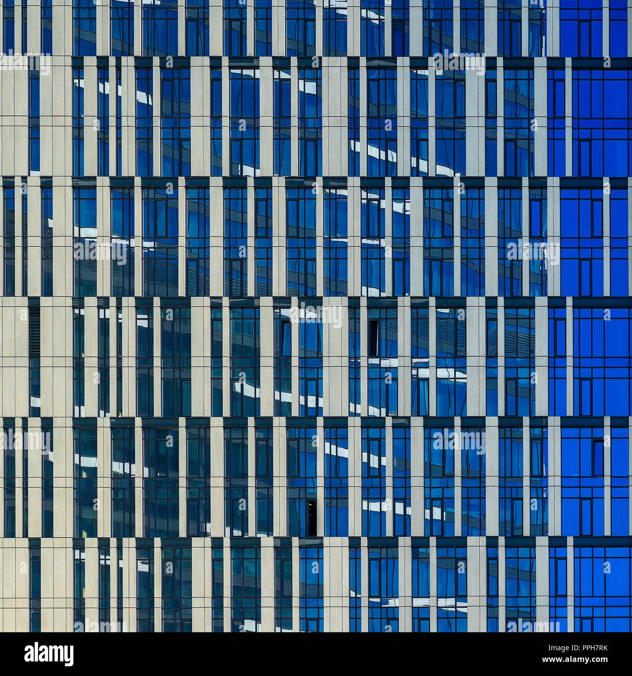 Windows of skyscraper, architecture close up. Glass and concrete. Urban ...