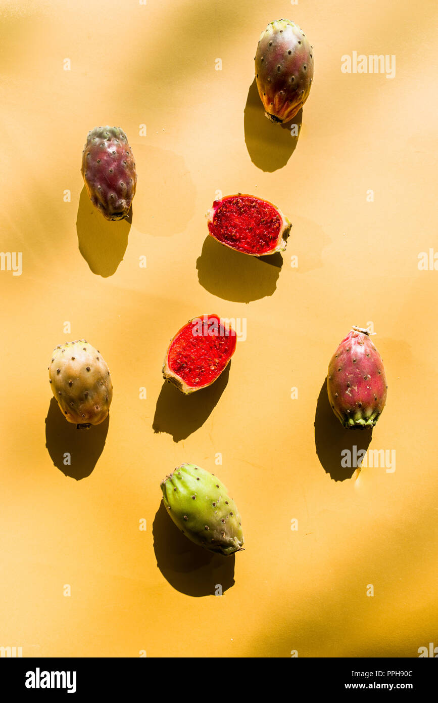 Prickly Pear Fruit still life, on a yellow background, with natural ...