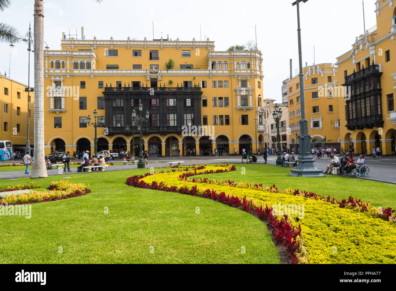 Tourists, residents and shoppers in the center of Lima Peru, the Plaza ...