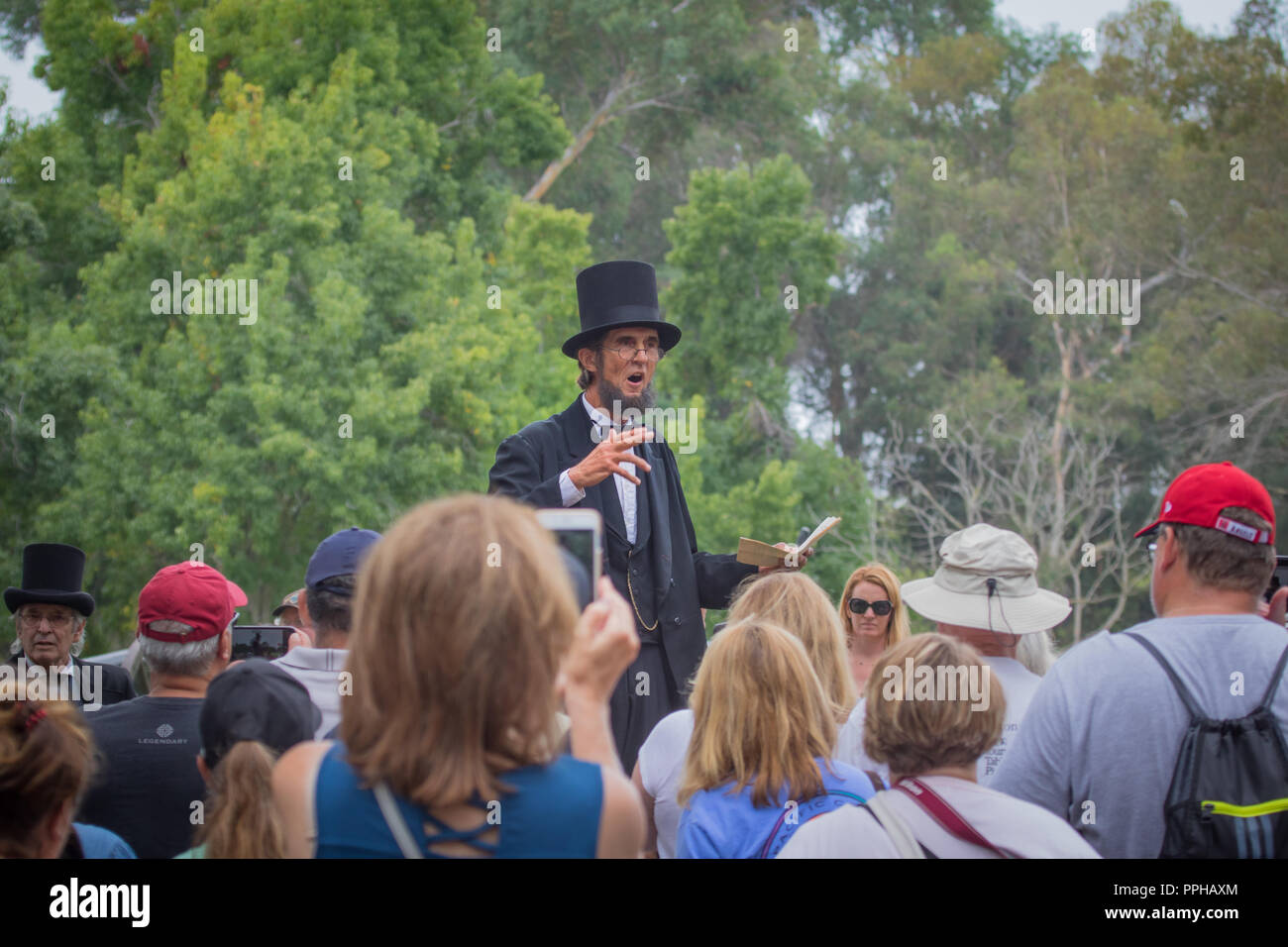 An actor playing Abraham Lincoln gives the Gettysburg Address to a ...