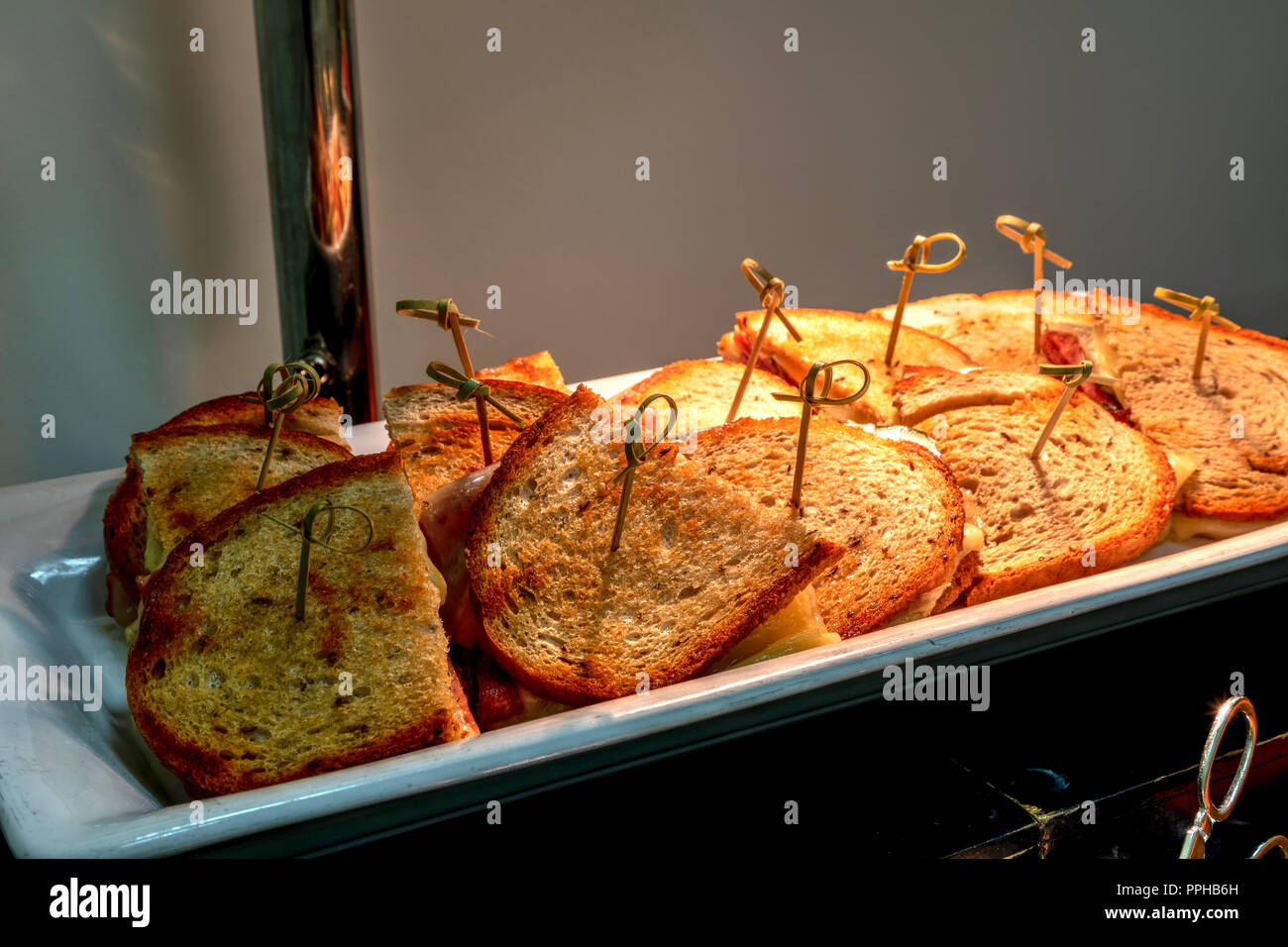 Grilled Reuben sandwich made with corned beef, sauerkraut and Swiss ...