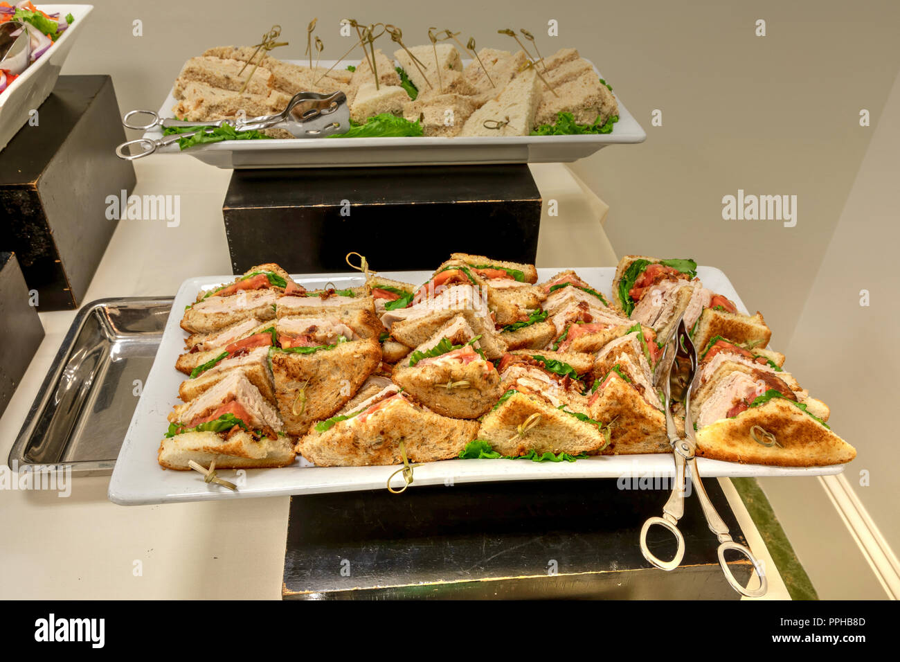 Turkey club sandwich made with turkey, tomato, bacon, mayo and lettuce ...