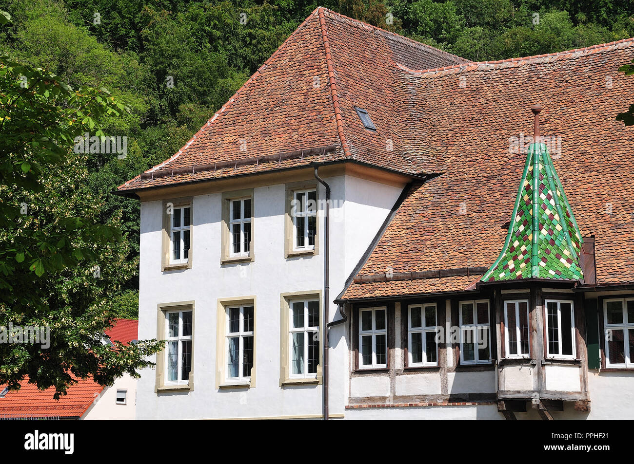 building in monastery yard of Blaubeuren, Germany, with traditional ...