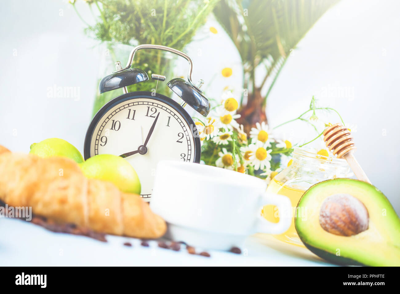 morning coffee in a white cup Croissant Avocado Awakening with an alarm ...