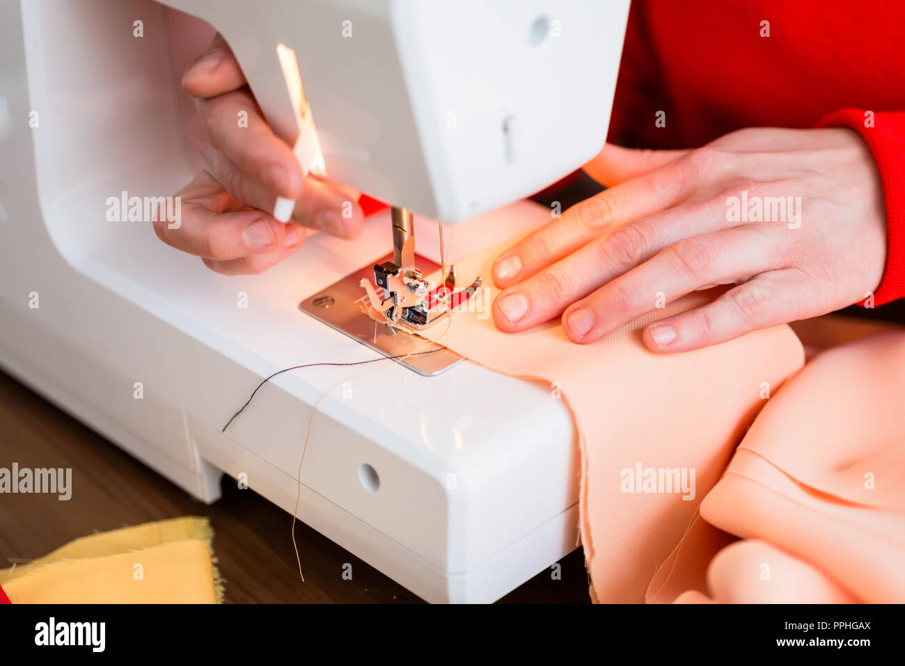 Tailoring person hi-res stock photography and images - Alamy