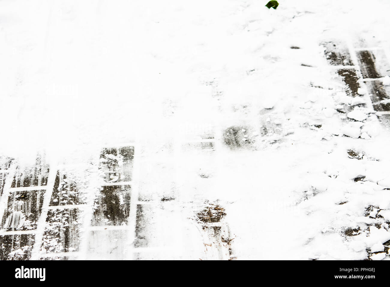 Pavement road with ice melting hi-res stock photography and images - Alamy