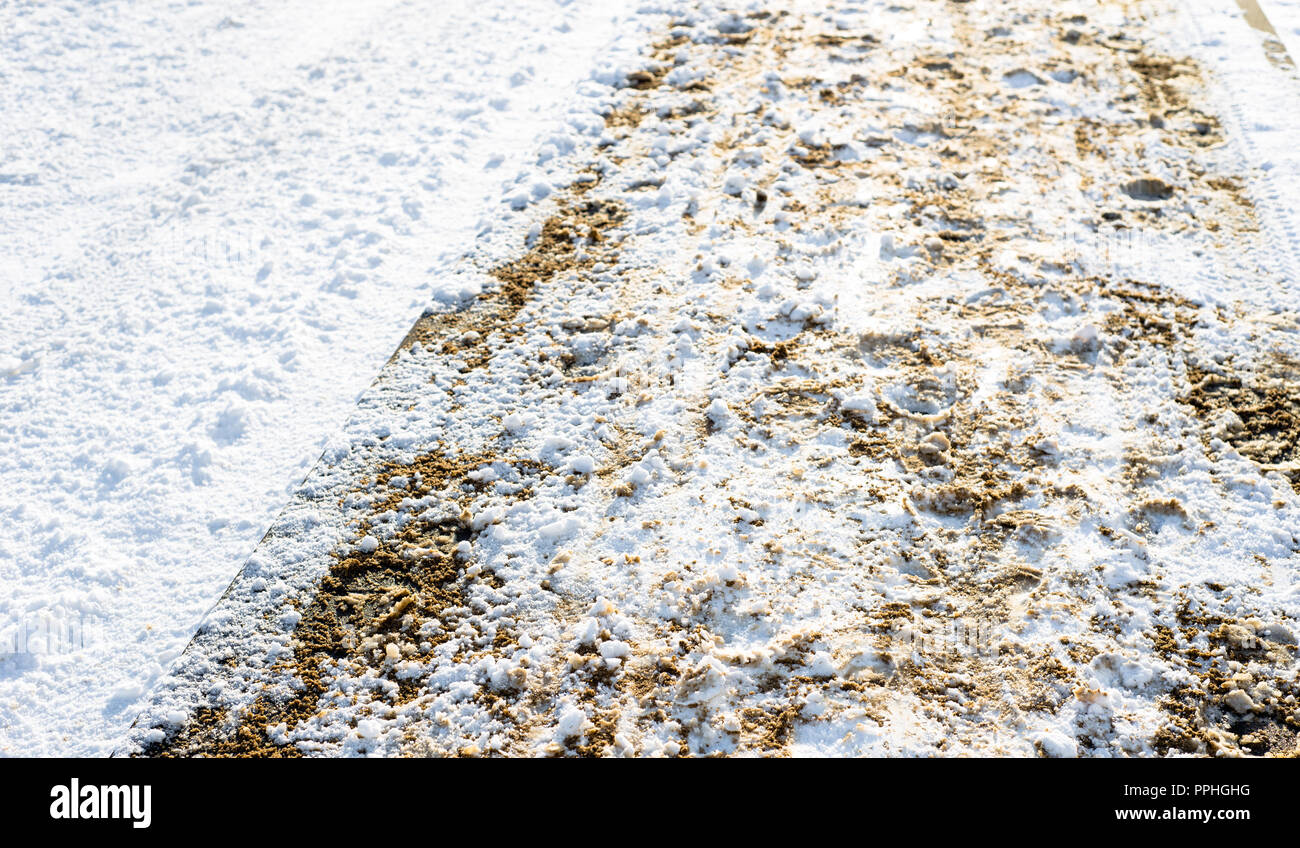 Footpath and road in winter, background with snow and sand Stock Photo ...