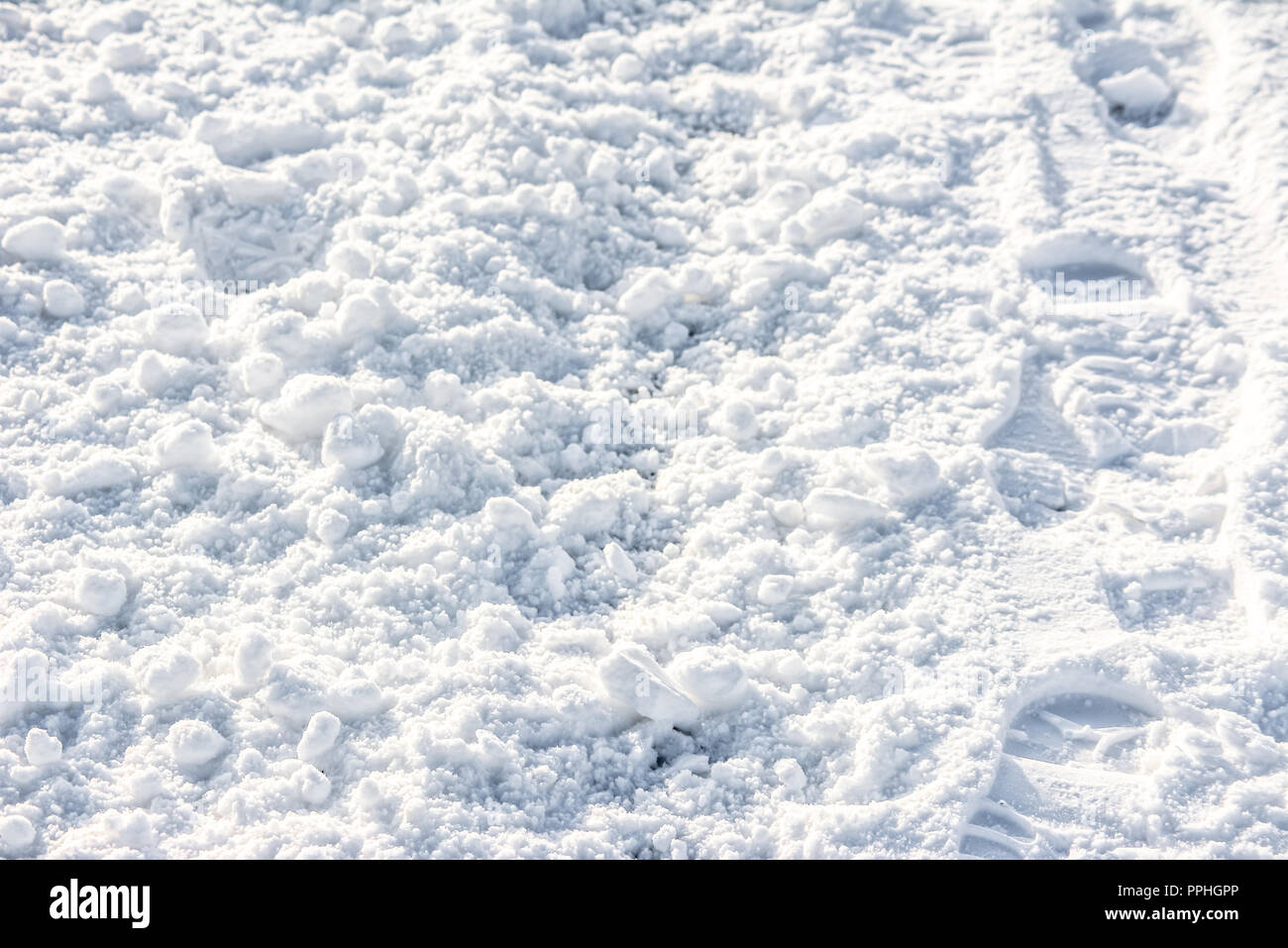 White texture, snow backgrounds with footprints on path Stock Photo - Alamy