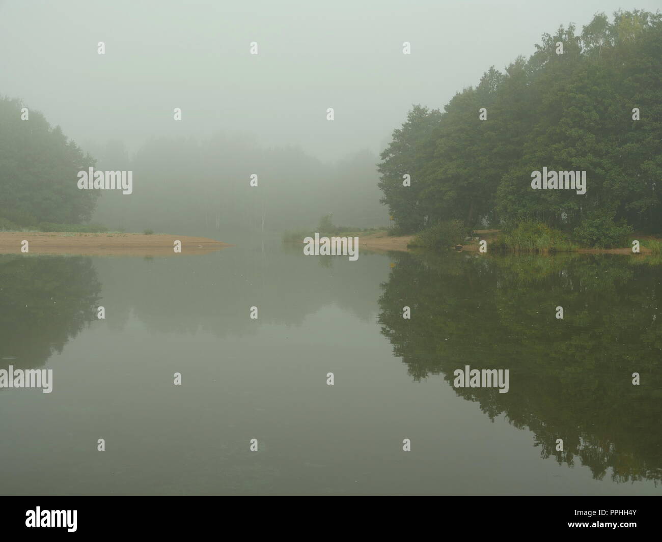 white morning mist over the river Stock Photo - Alamy