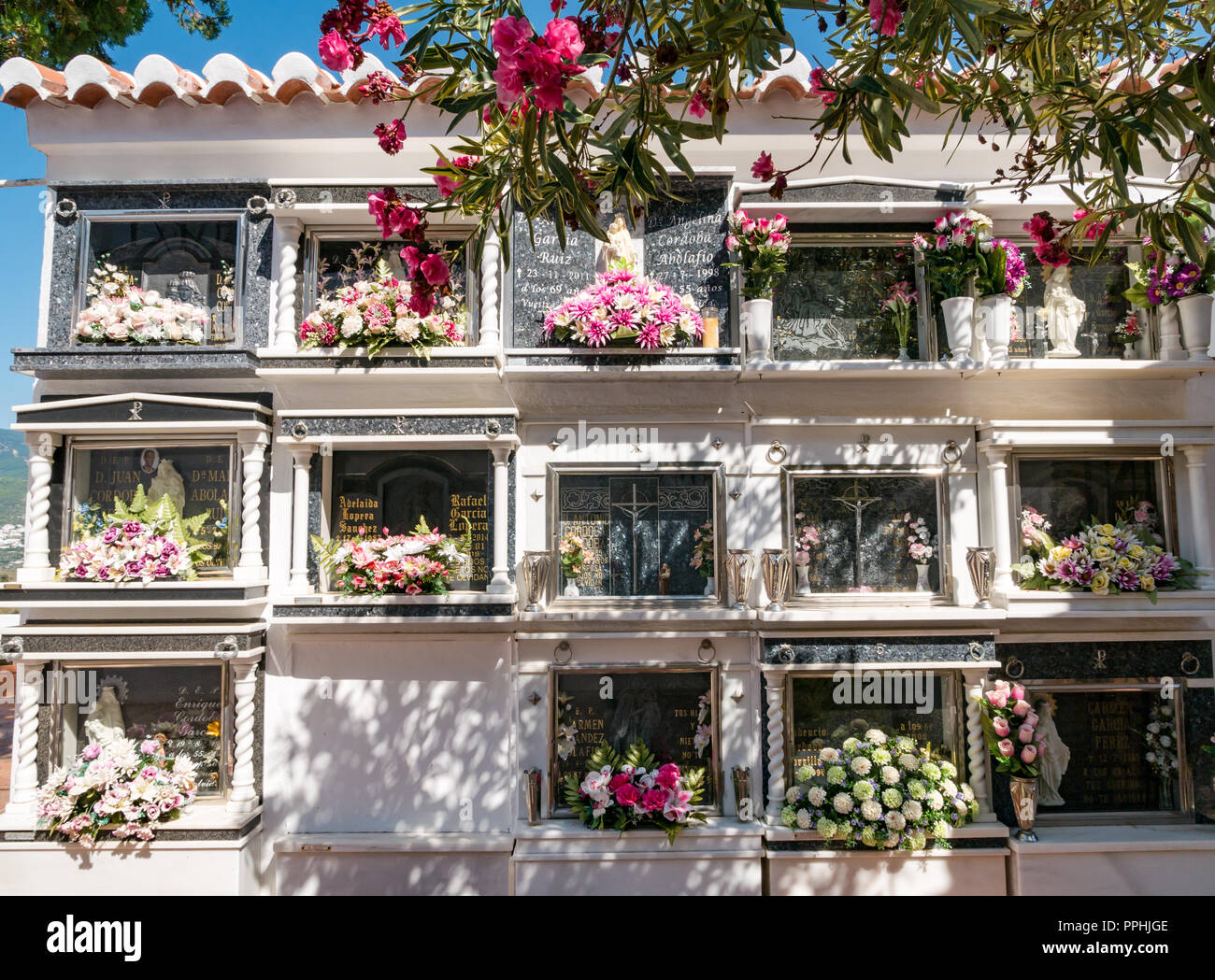 Catholic cemetery graves, mountain village of Corumbela, Axarquia ...