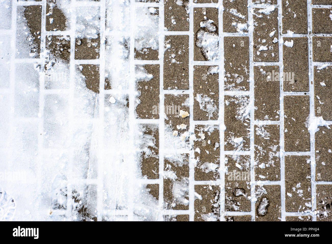 Background with snow on walkway in winter, texture Stock Photo - Alamy