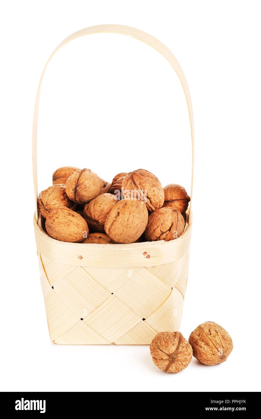 walnut in wooden basket, isolated on white background Stock Photo - Alamy