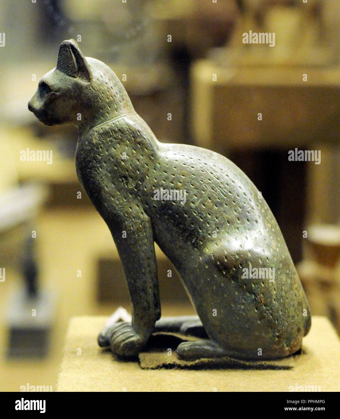 Bronze statue of the goddess Bastet represented as a domesticated cat ...