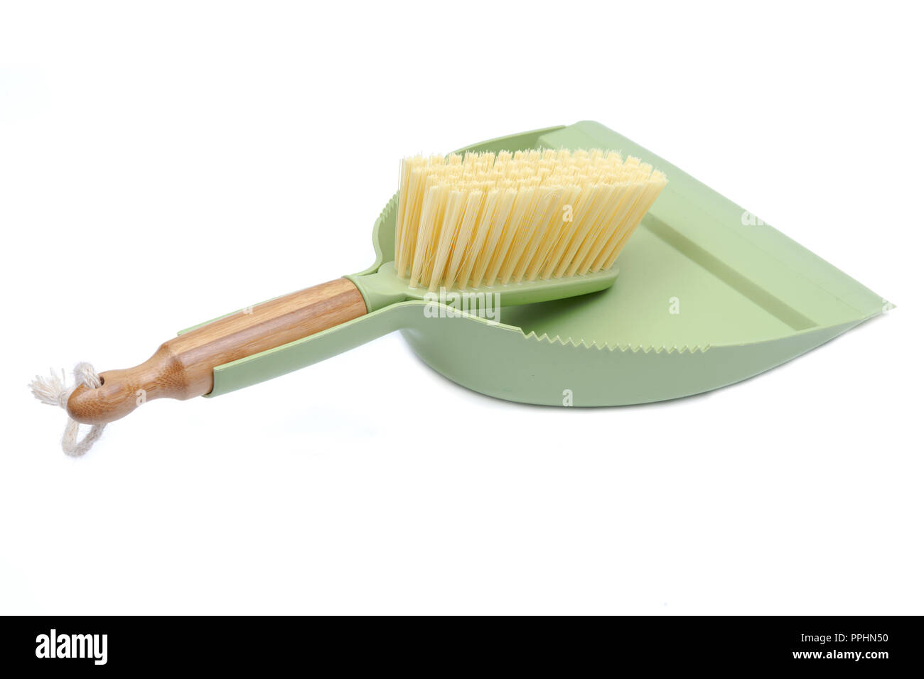Green dustpan and natural bamboo broom set isolated on white background ...