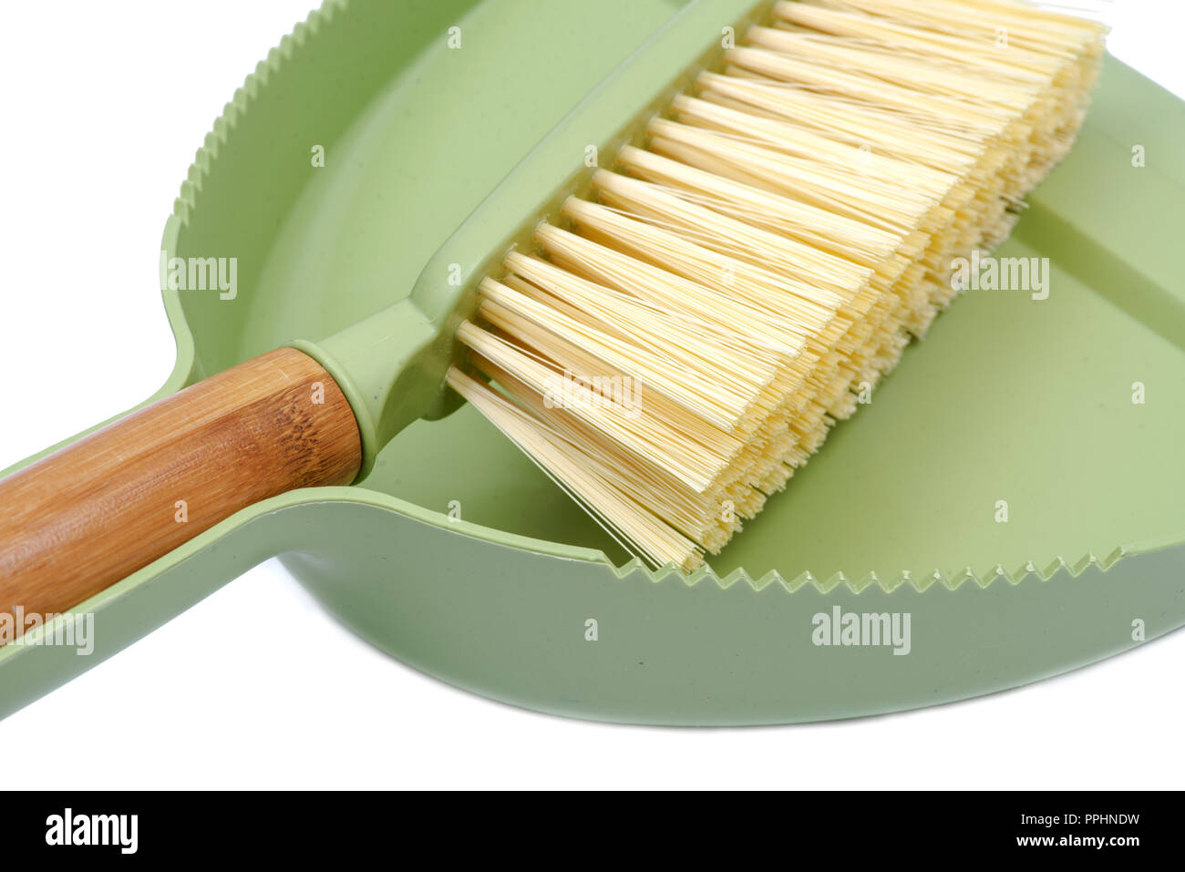 Green dustpan and natural bamboo broom set isolated on white background ...