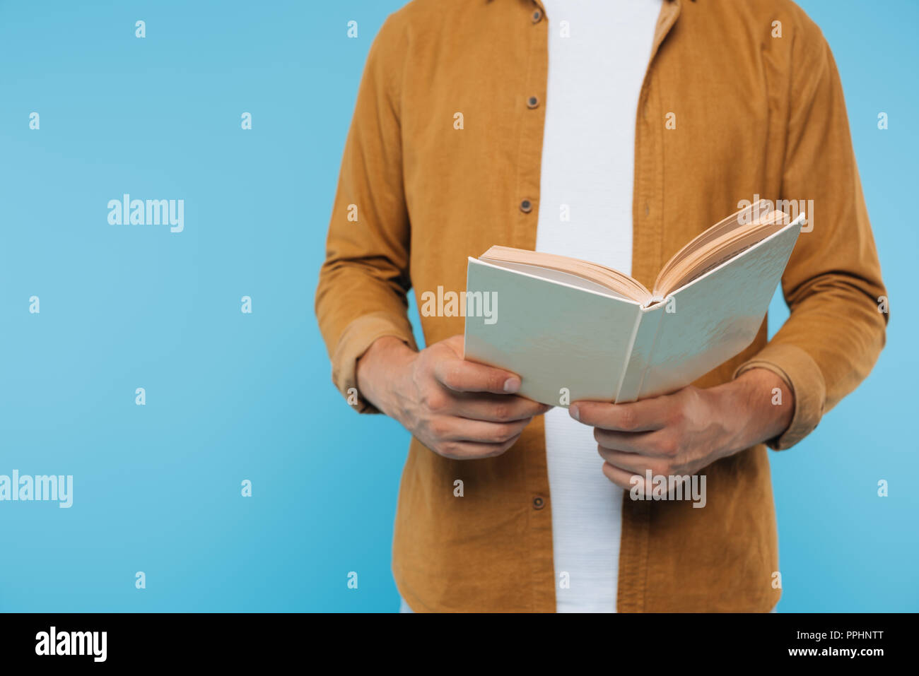 Man holding open book hi-res stock photography and images - Alamy
