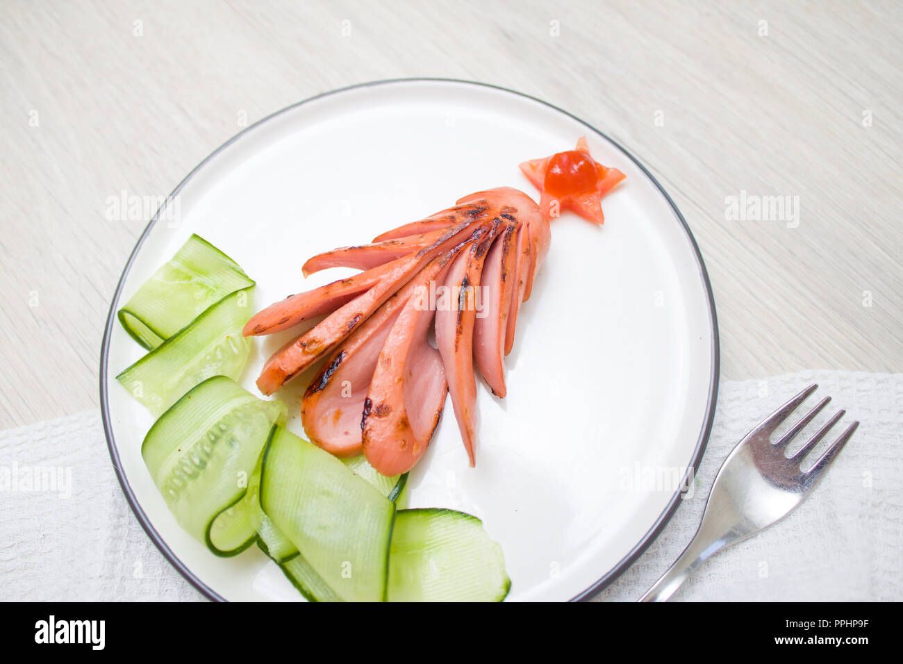 Funny edible Christmas tree made from fried grilled sausages, Breakfast ...