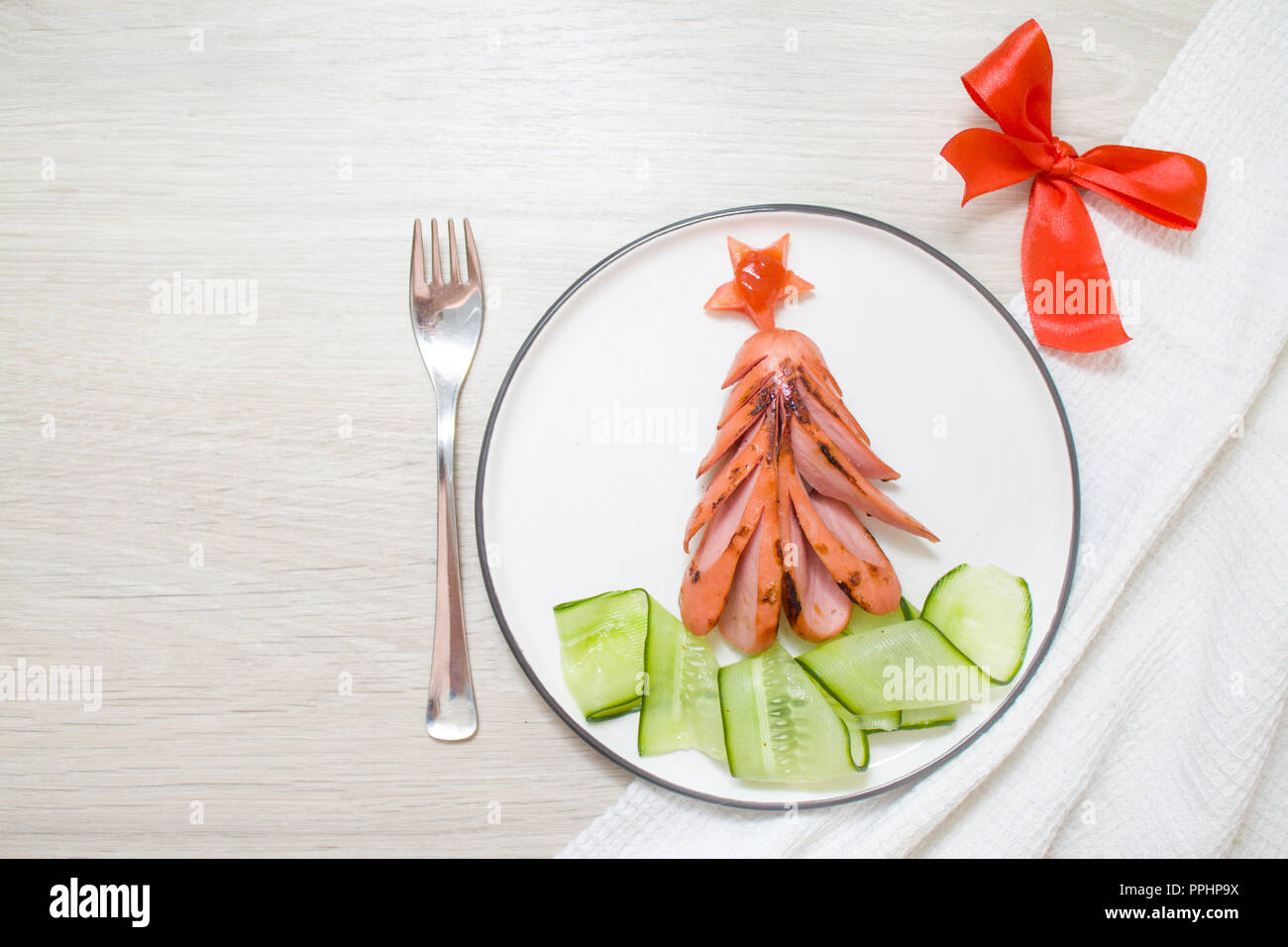 Funny edible Christmas tree made from fried grilled sausages, Breakfast ...