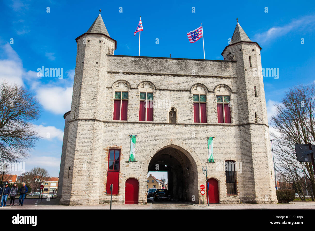 The antique Cross gate of the ramparts in the historical town of Bruges ...