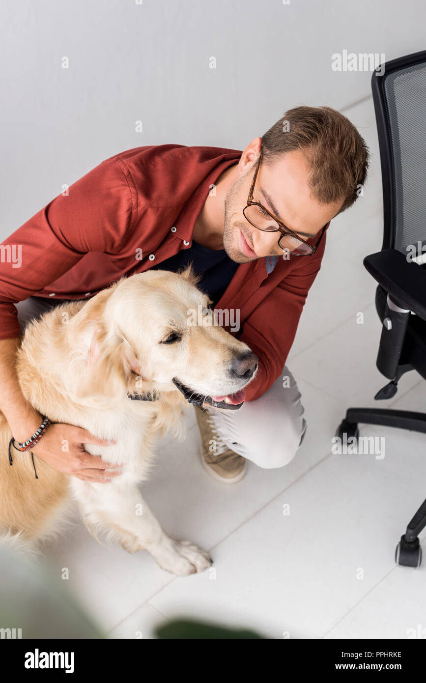 Man hugging golden retriever hi-res stock photography and images - Alamy