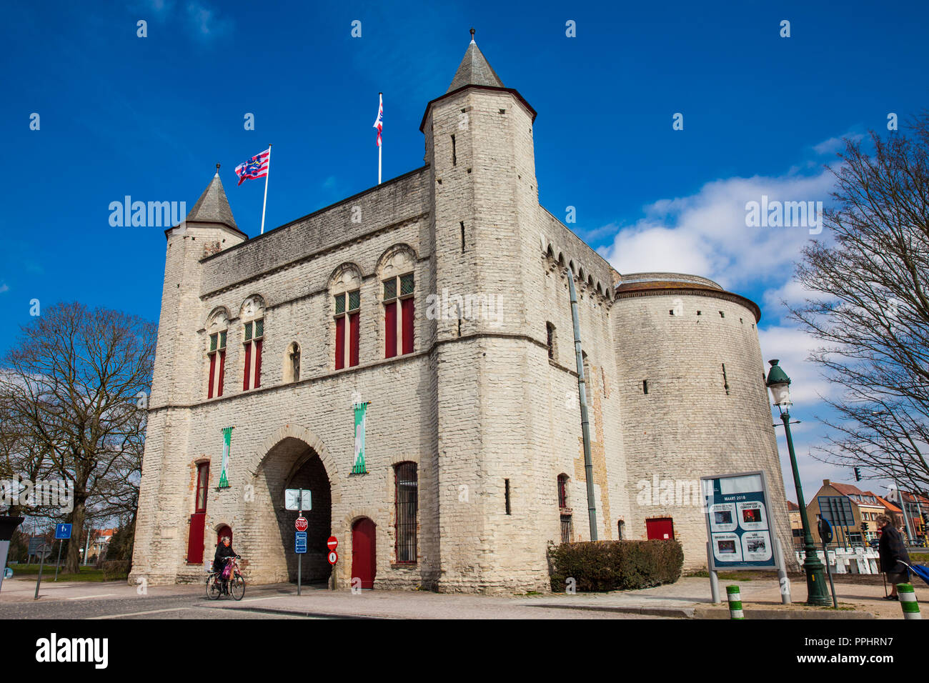 The antique Cross gate of the ramparts in the historical town of Bruges ...