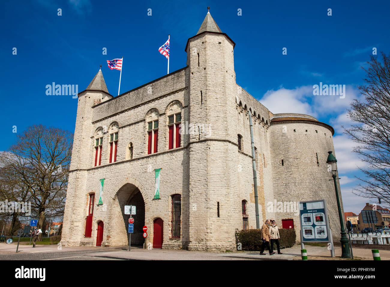 The antique Cross gate of the ramparts in the historical town of Bruges ...