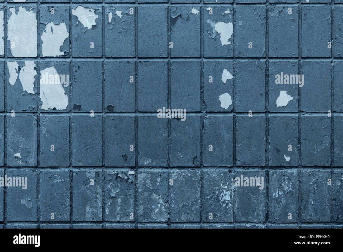 old dark brick wall with weathered paint background Stock Photo - Alamy