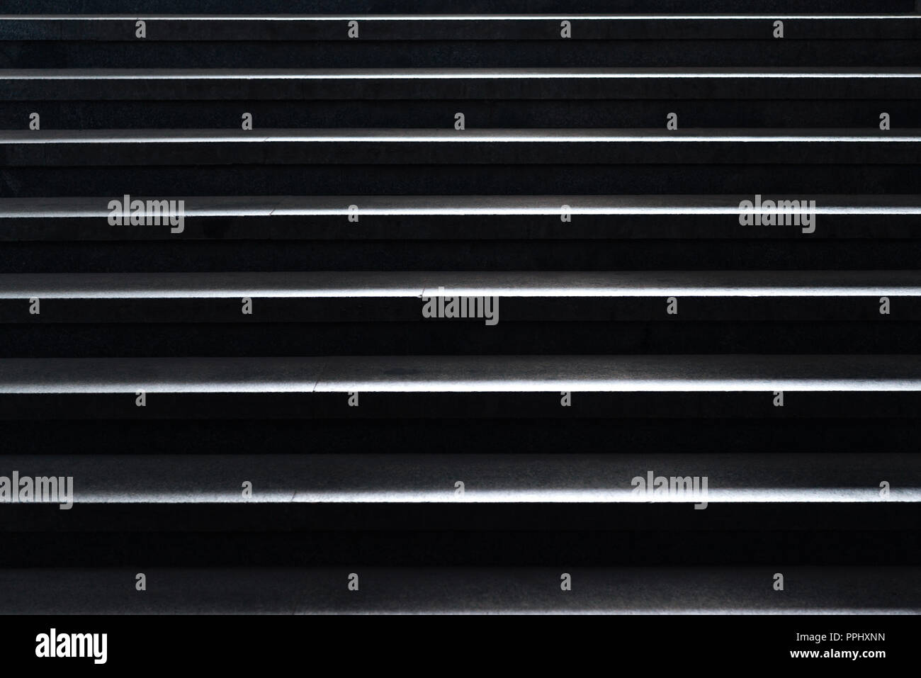 shiny horizontal metal strips on black Stock Photo - Alamy