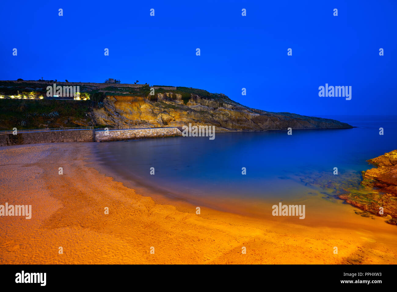 Llanes Playa del Sablon beach sunset in Asturias of Spain Stock Photo ...