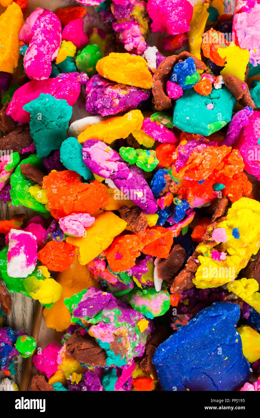 Dry colorful play dough in smal pieces Stock Photo - Alamy
