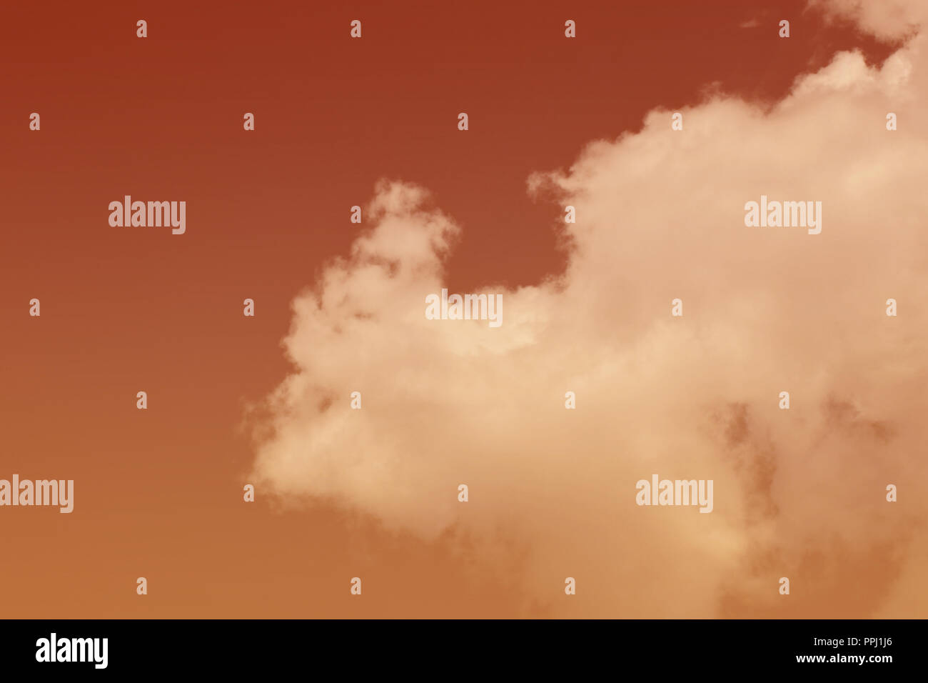 Nature background. Fluffy soft clouds in sky toned Stock Photo - Alamy
