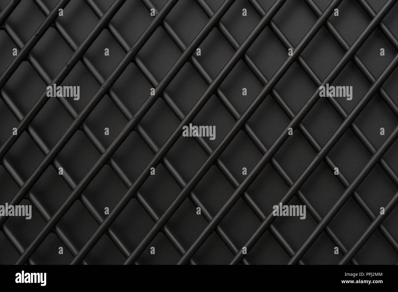 The iron lattice painted with black paint. Textural background Stock ...