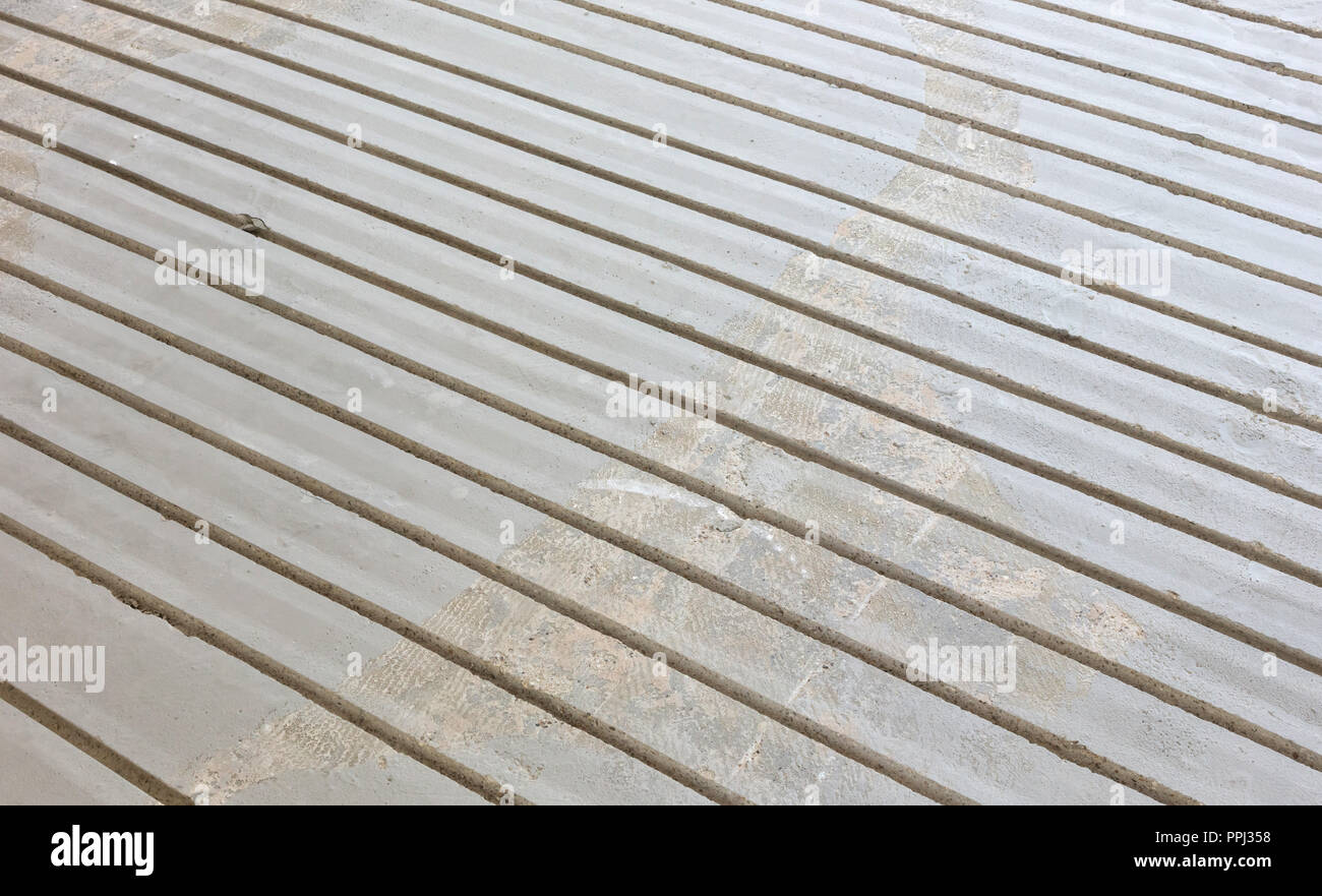 Milling in concrete floor - Preparation for underfloor heating Stock ...