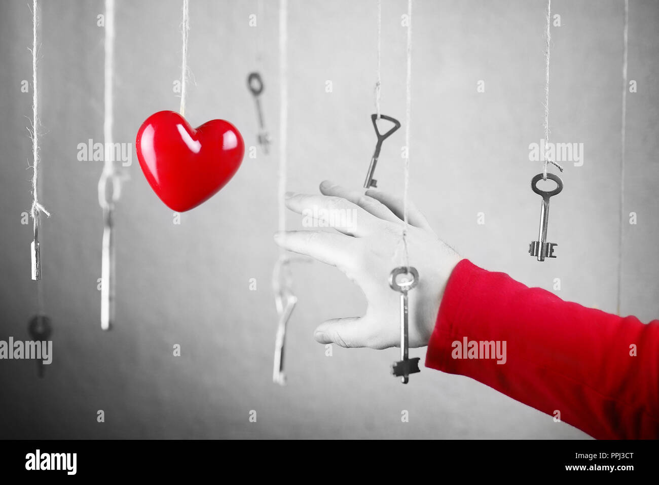 conceptual photo hand stretching for one of the many old vintage Stock ...