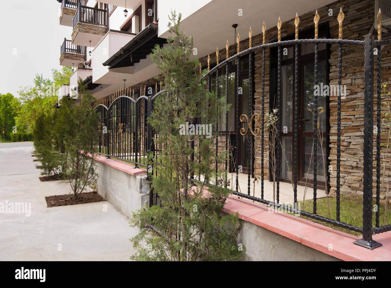 Wrought Iron Fence. Yard on Modern Building Exterior. Facade of a ...