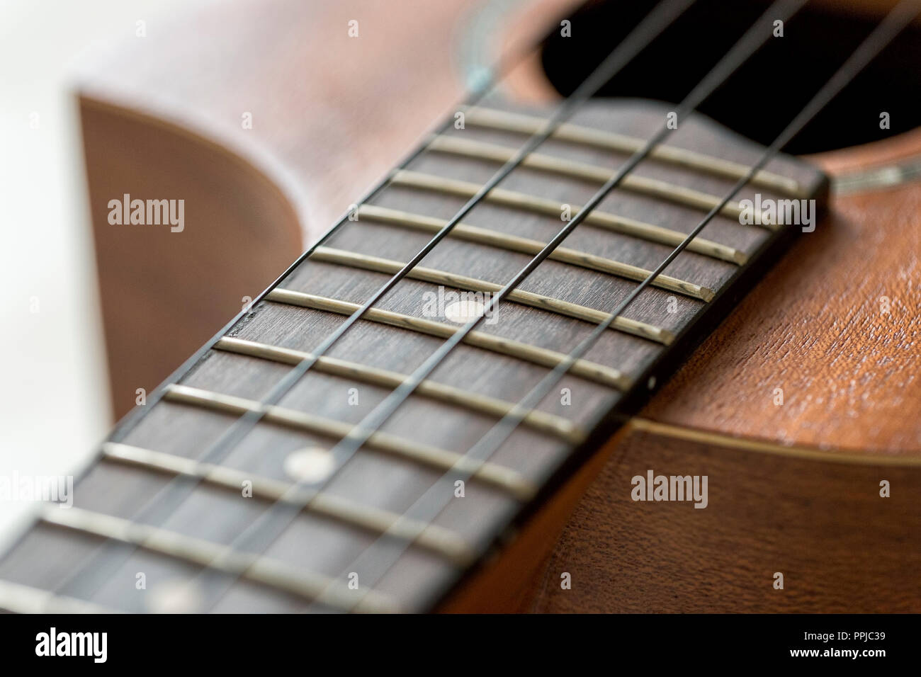 Ukulele Fretboard Close Up Stock Photo - Alamy