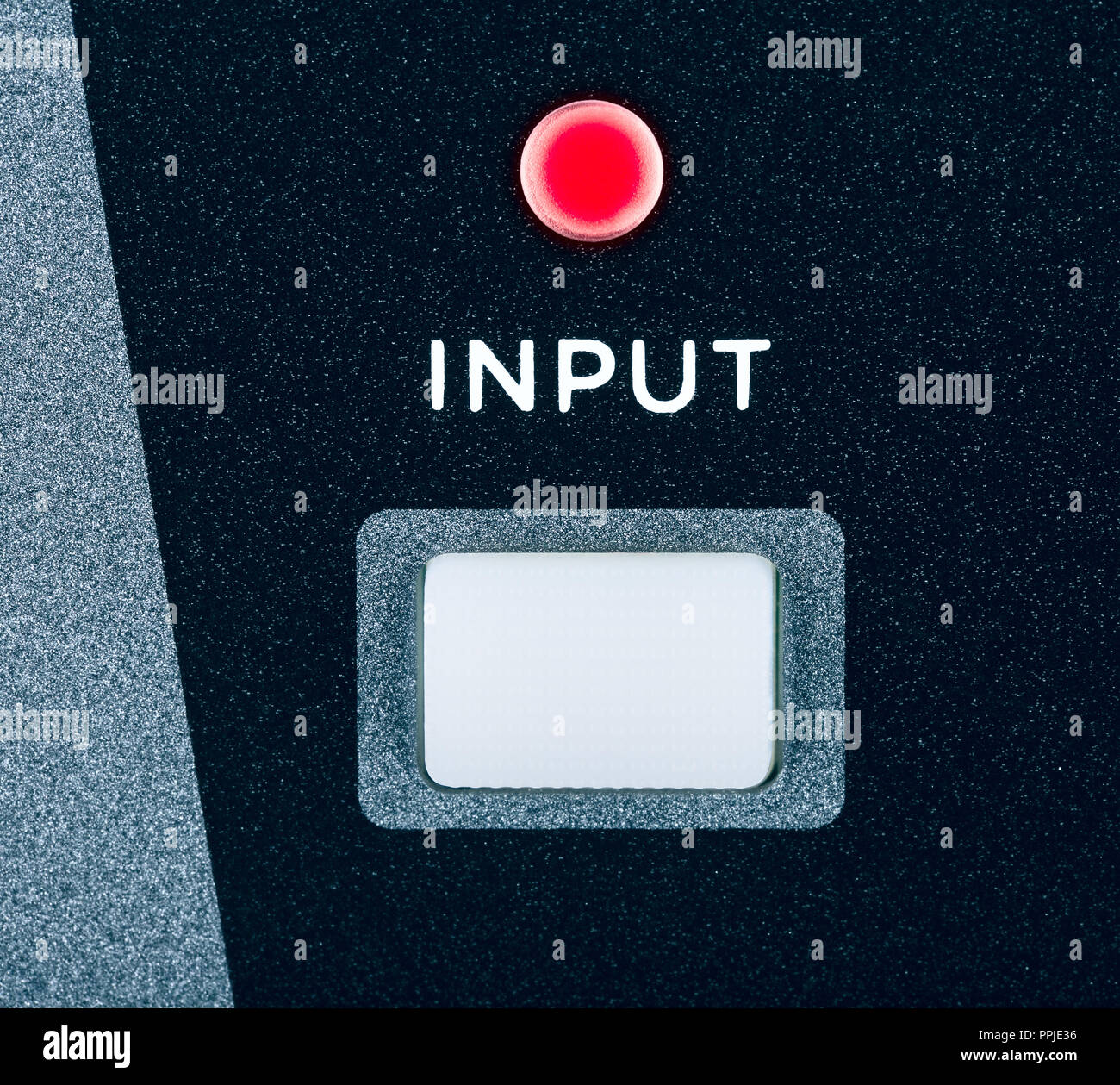 gray amplifier input button, close up shot Stock Photo - Alamy