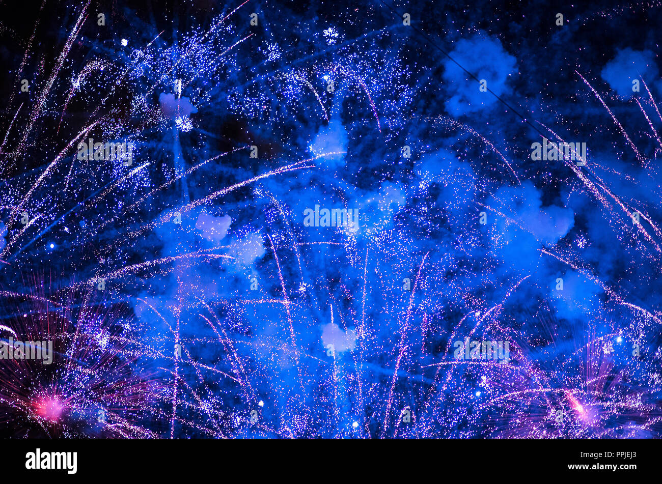 Christmas celebration neon sparkling explosion of fireworks Stock Photo ...