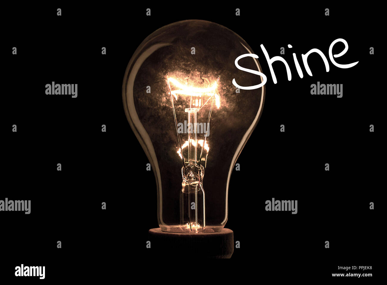 Realistic electric light bulb on black background Stock Photo - Alamy