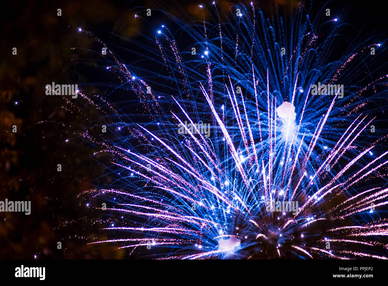 Christmas celebration neon sparkling explosion of fireworks Stock Photo ...