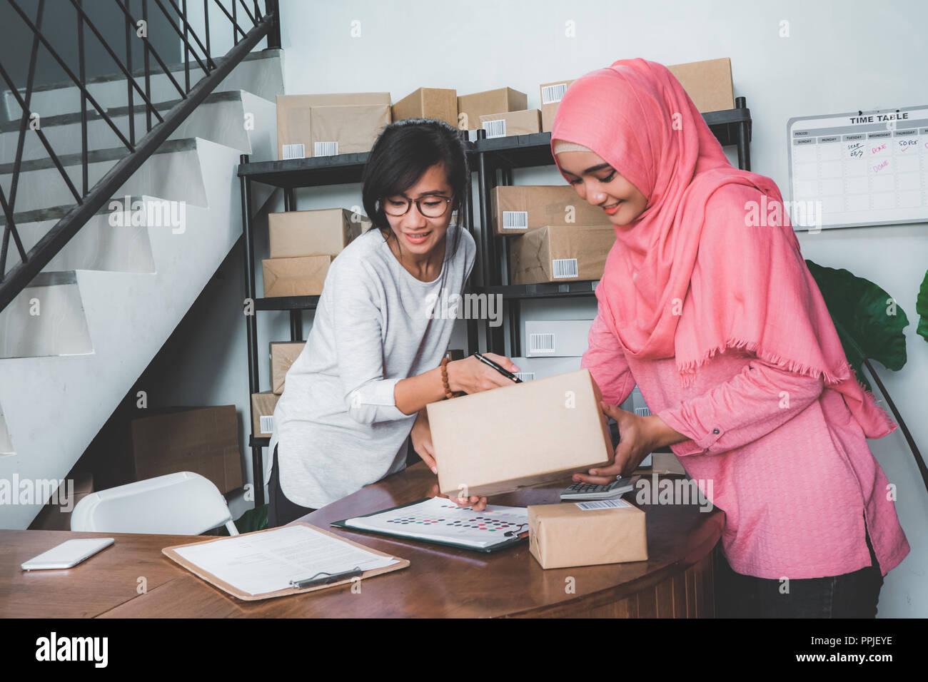 woman business partner in small office Stock Photo - Alamy