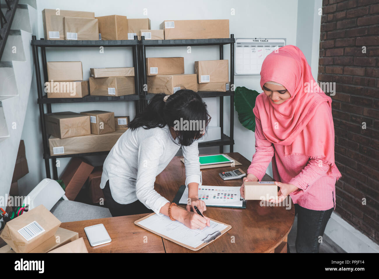 woman business partner in small office Stock Photo - Alamy