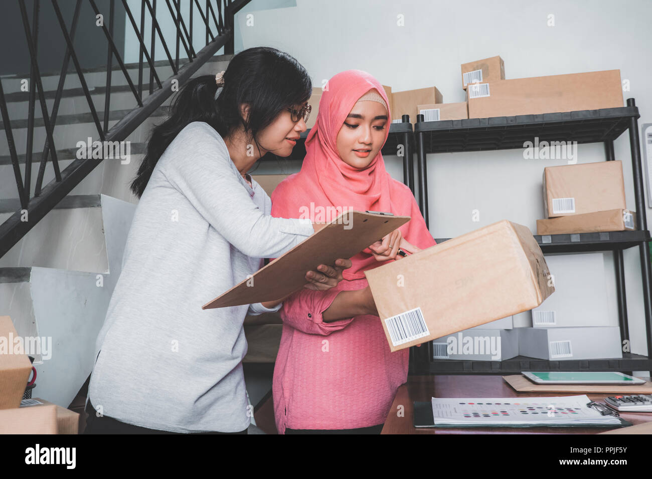 woman business partner in small office Stock Photo - Alamy