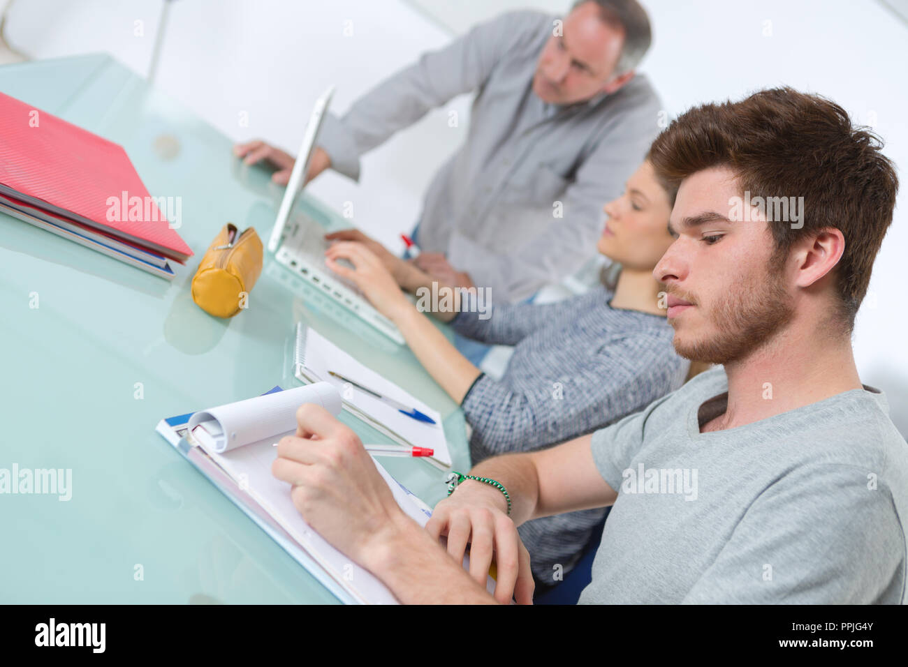 group shot of students in classroom Stock Photo - Alamy