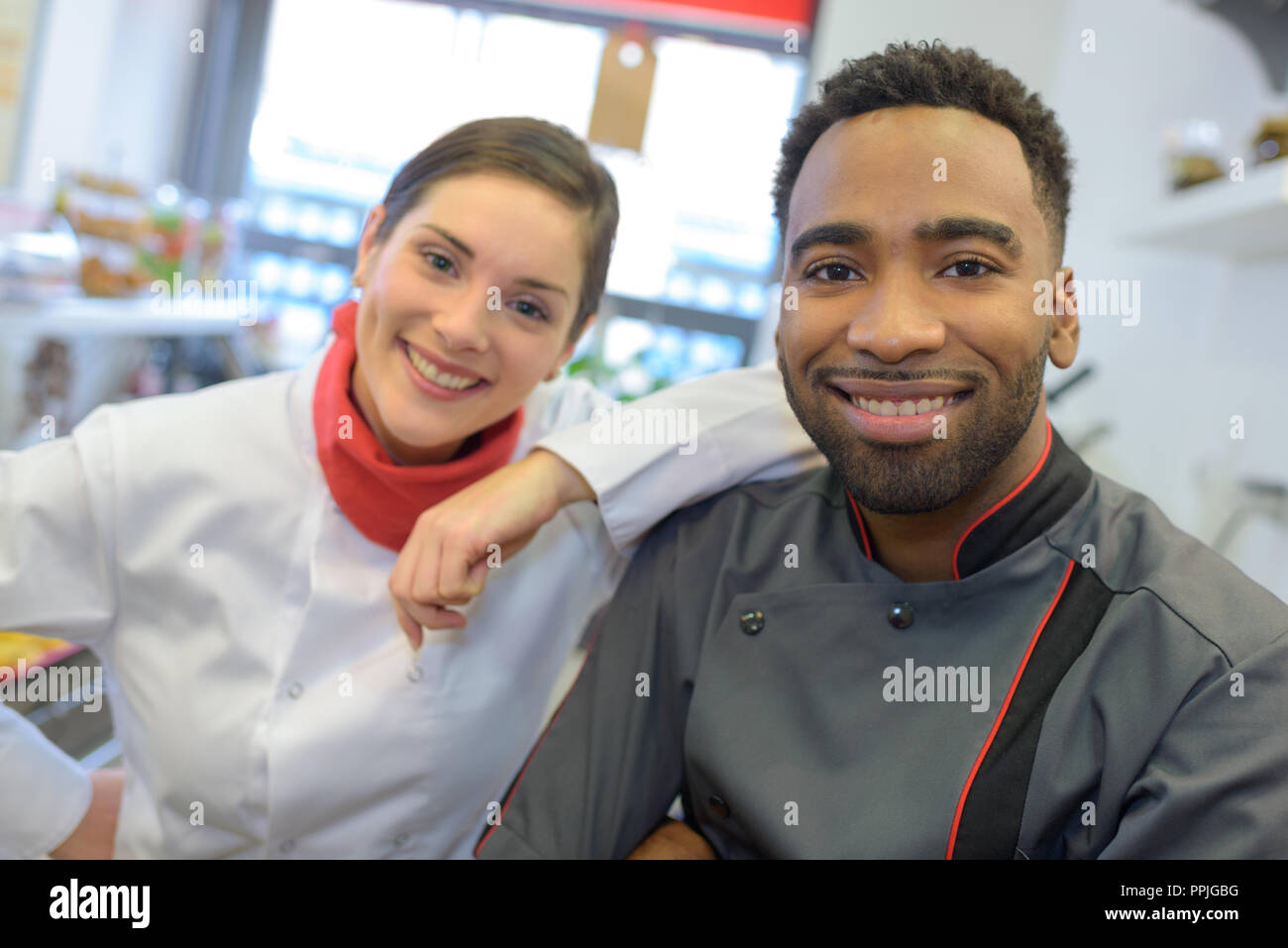 team of cooks in a commercial kitchen Stock Photo - Alamy