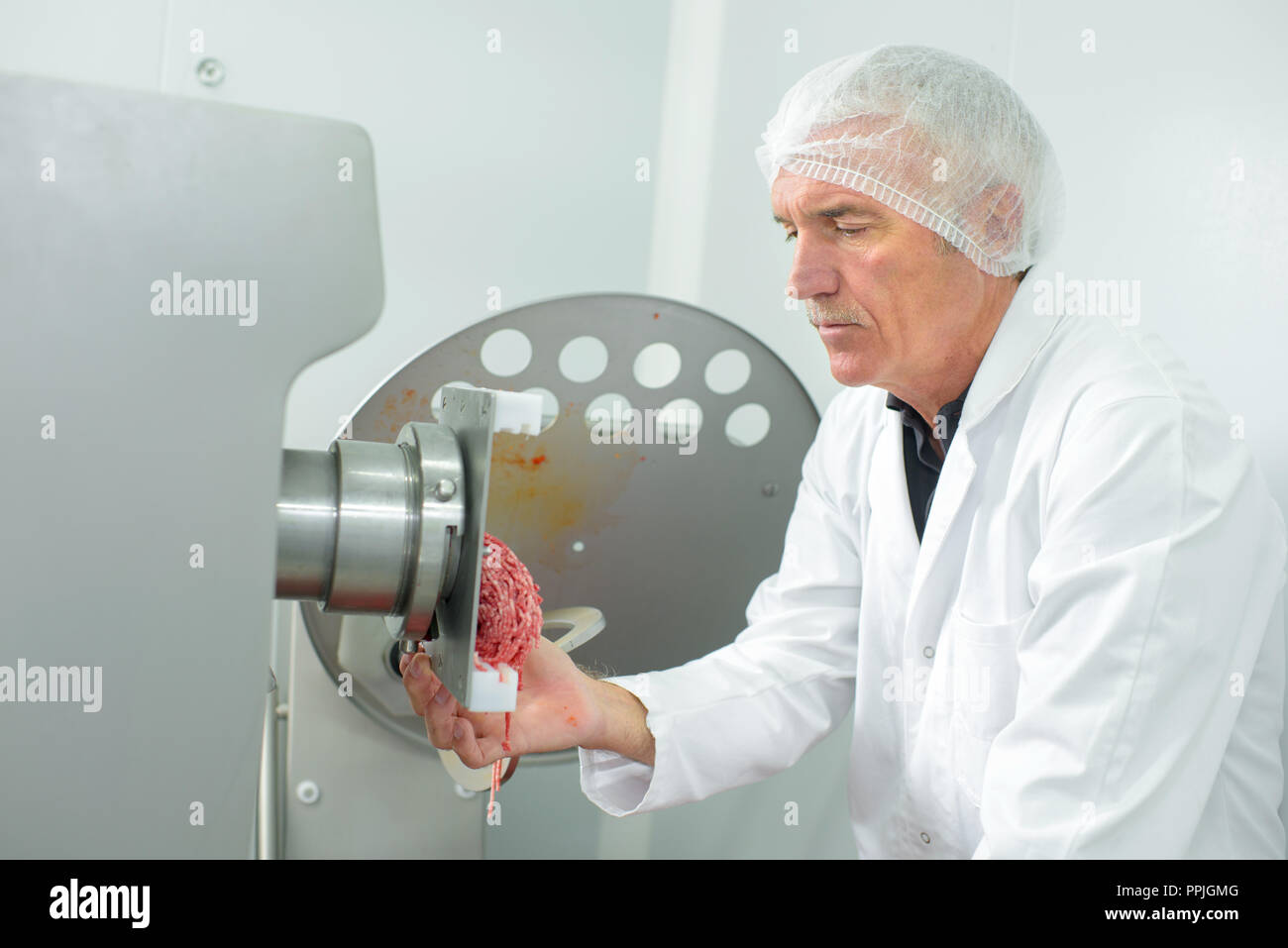 Mincing machine hi-res stock photography and images - Alamy