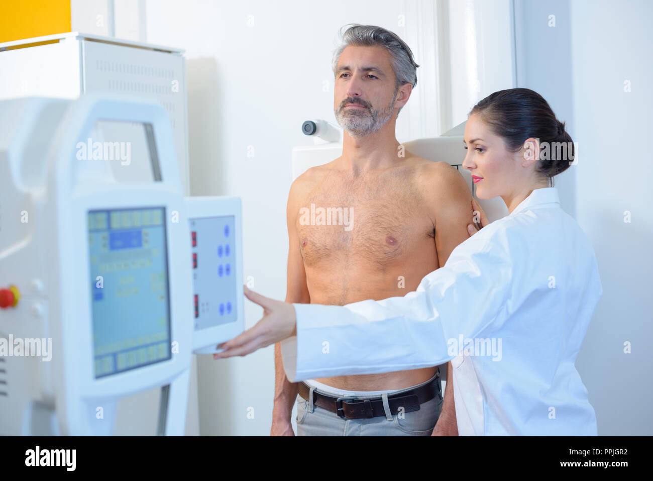 man getting ready for an xray Stock Photo - Alamy