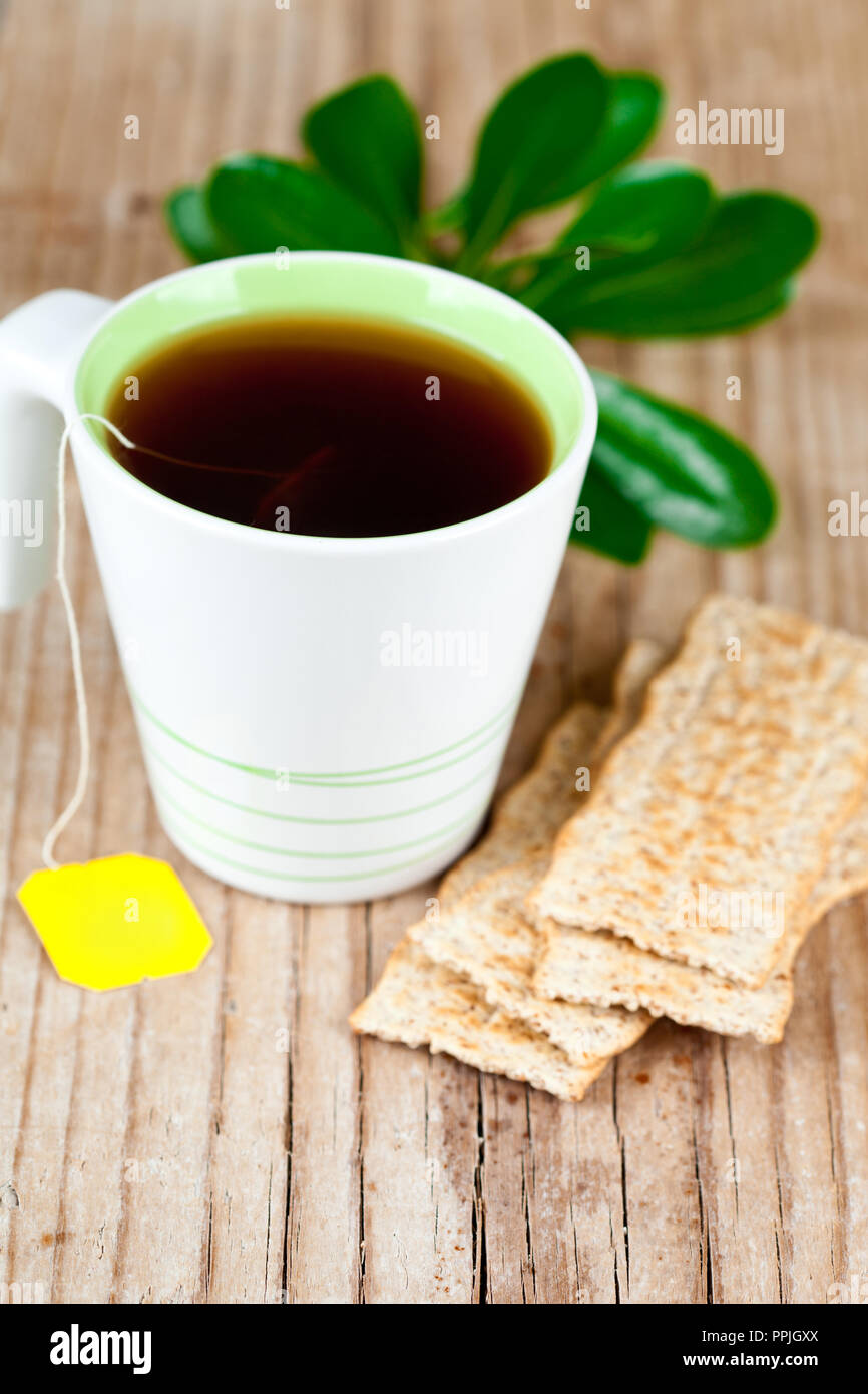 Hot cup of tea with cereal for breakfast hi-res stock photography and ...