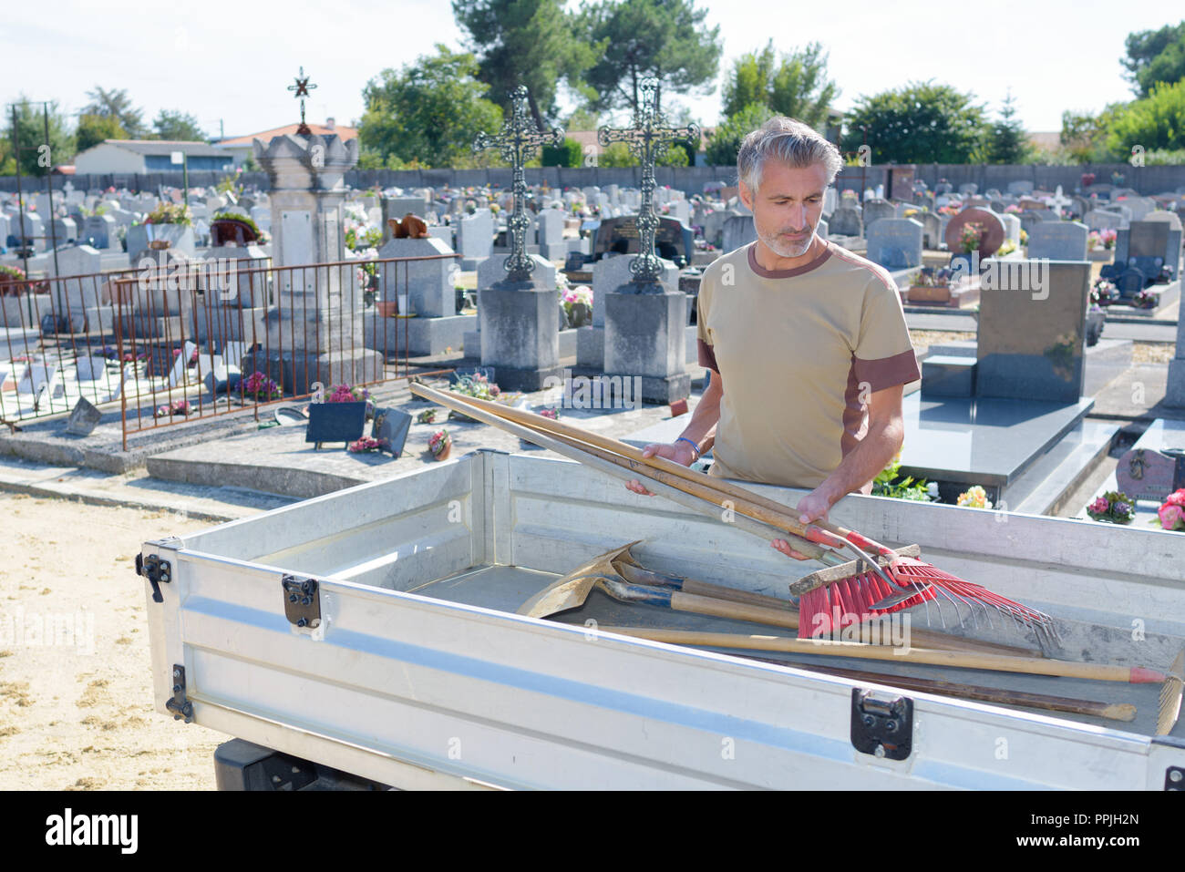 Loading rake hi-res stock photography and images - Alamy