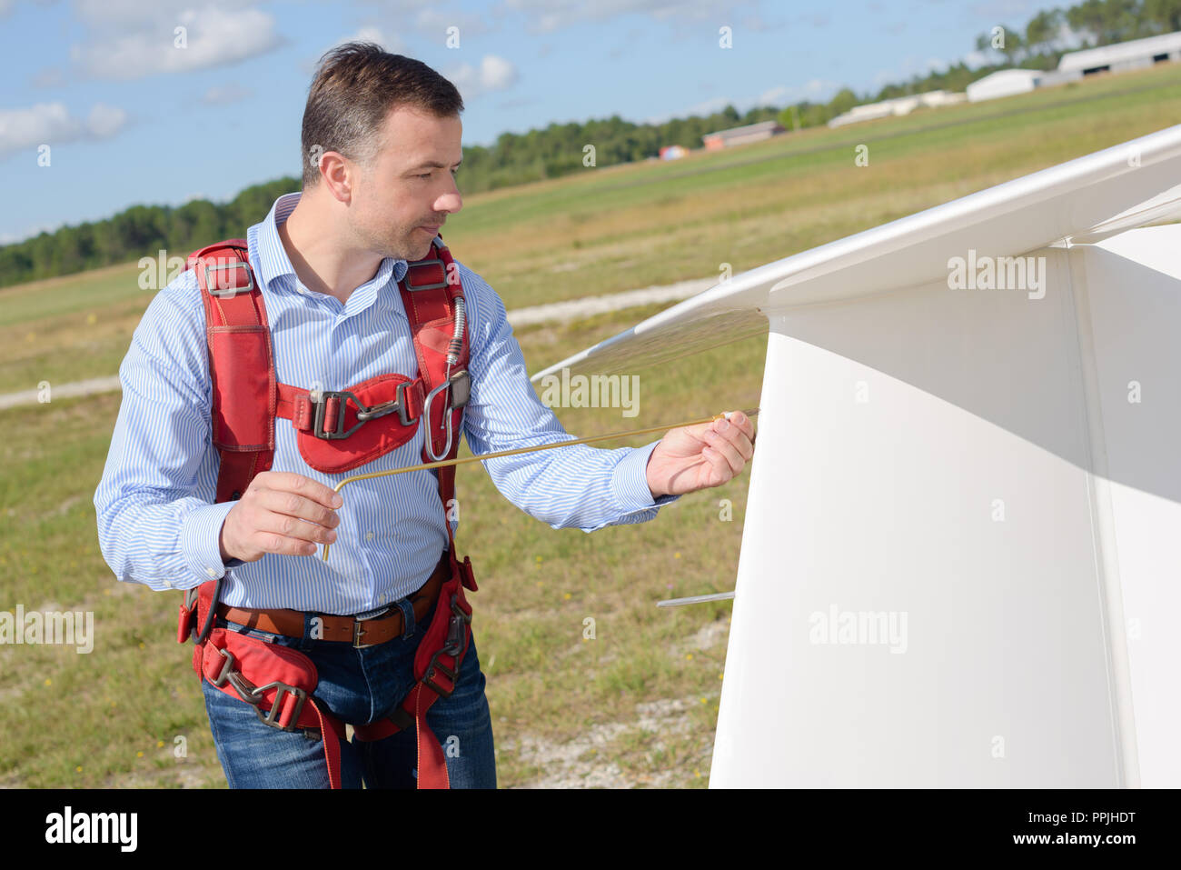 man with a small airplane Stock Photo - Alamy
